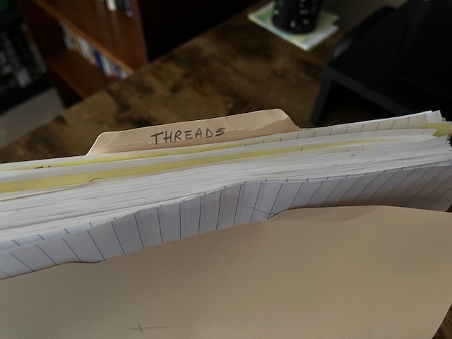 Cover Revealed: A Peek Behind the ‘Threads – The Tattered Page